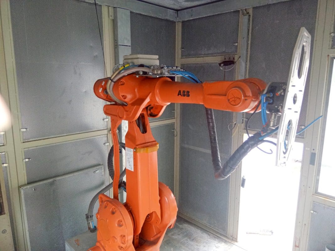 ABB IRB 2400 M2000 robotic machining cell - MASZYNERIA